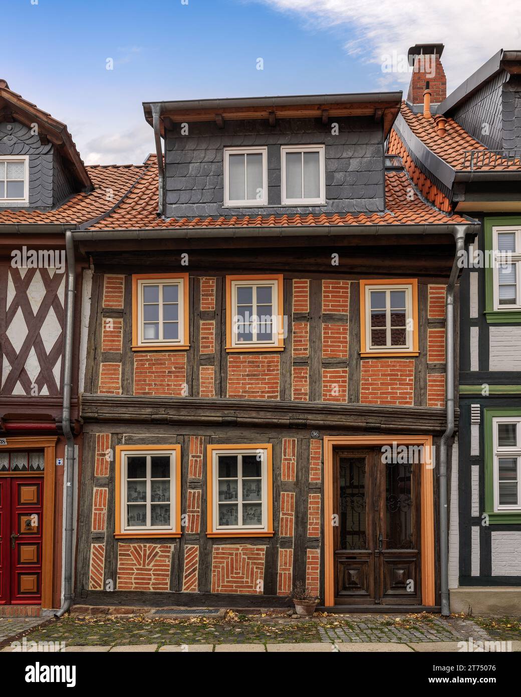 Medieval colorful half-timbered house in Wernigerode Stock Photo - Alamy