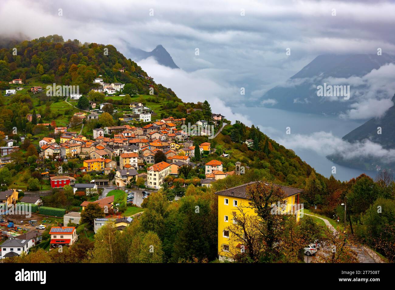 Aerial View over Mountainscape and Alpine Village Bre with Autumn ...