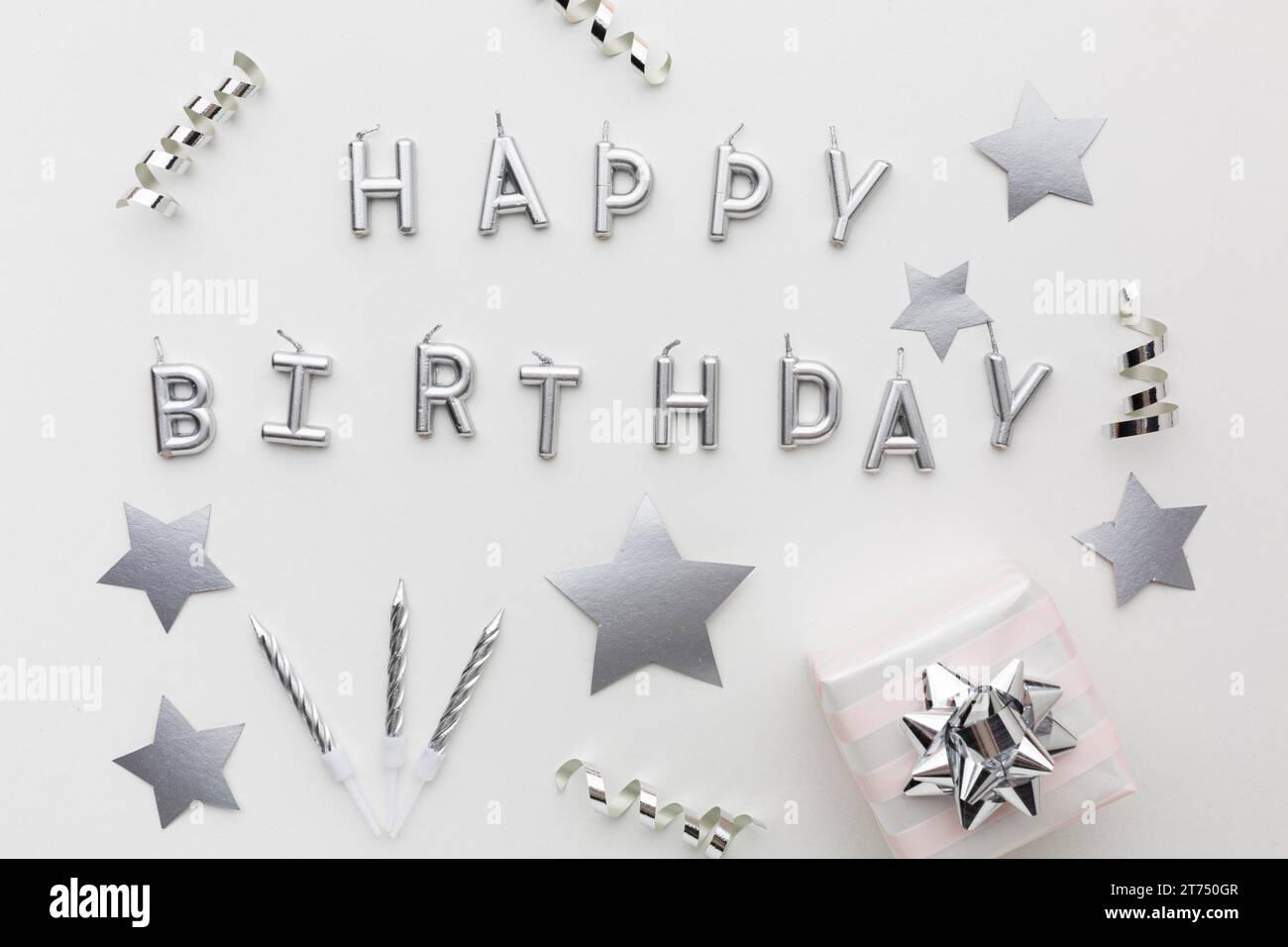 Silver decorations happy birthday message Stock Photo - Alamy