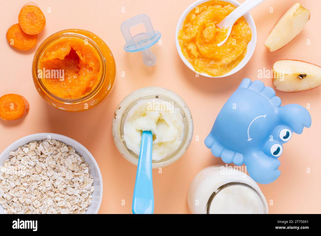 Baby food pink background top view Stock Photo - Alamy