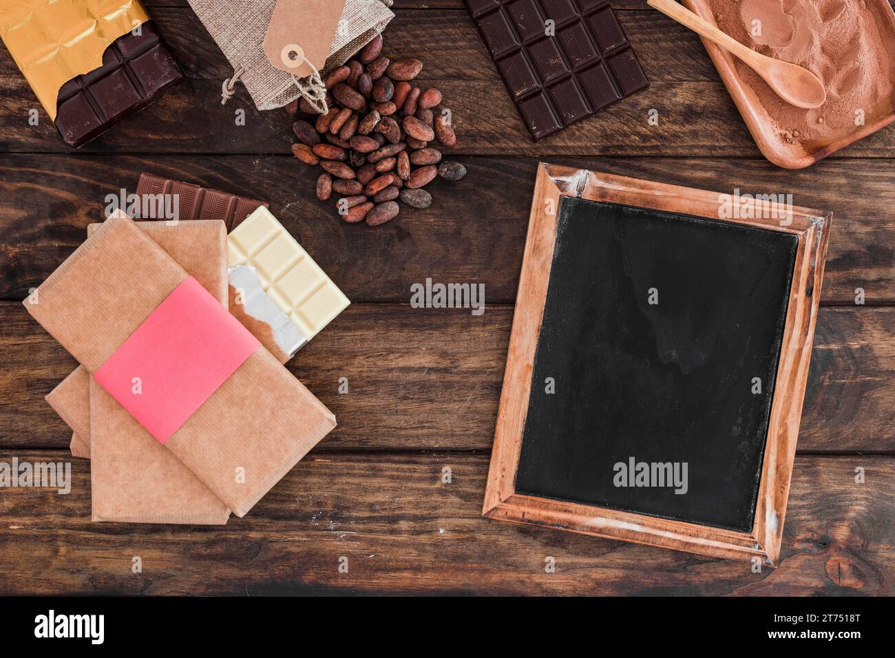 Chocolate bar stack blank wooden slate cocoa beans powder table Stock ...