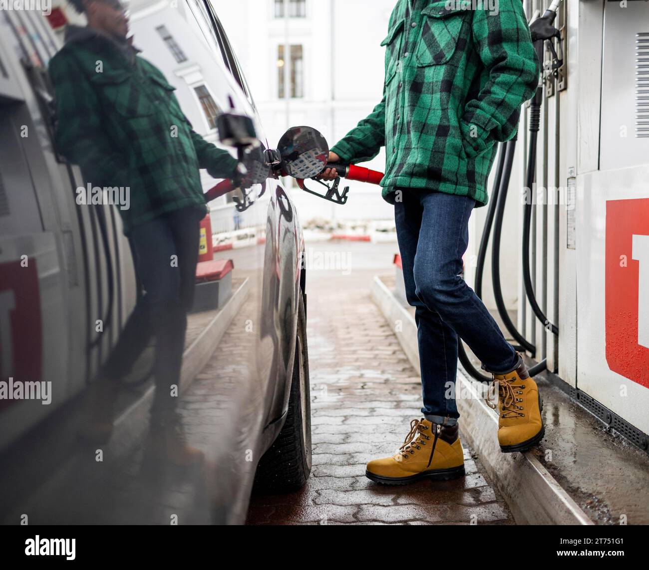 Close up man with car gas station Stock Photo - Alamy