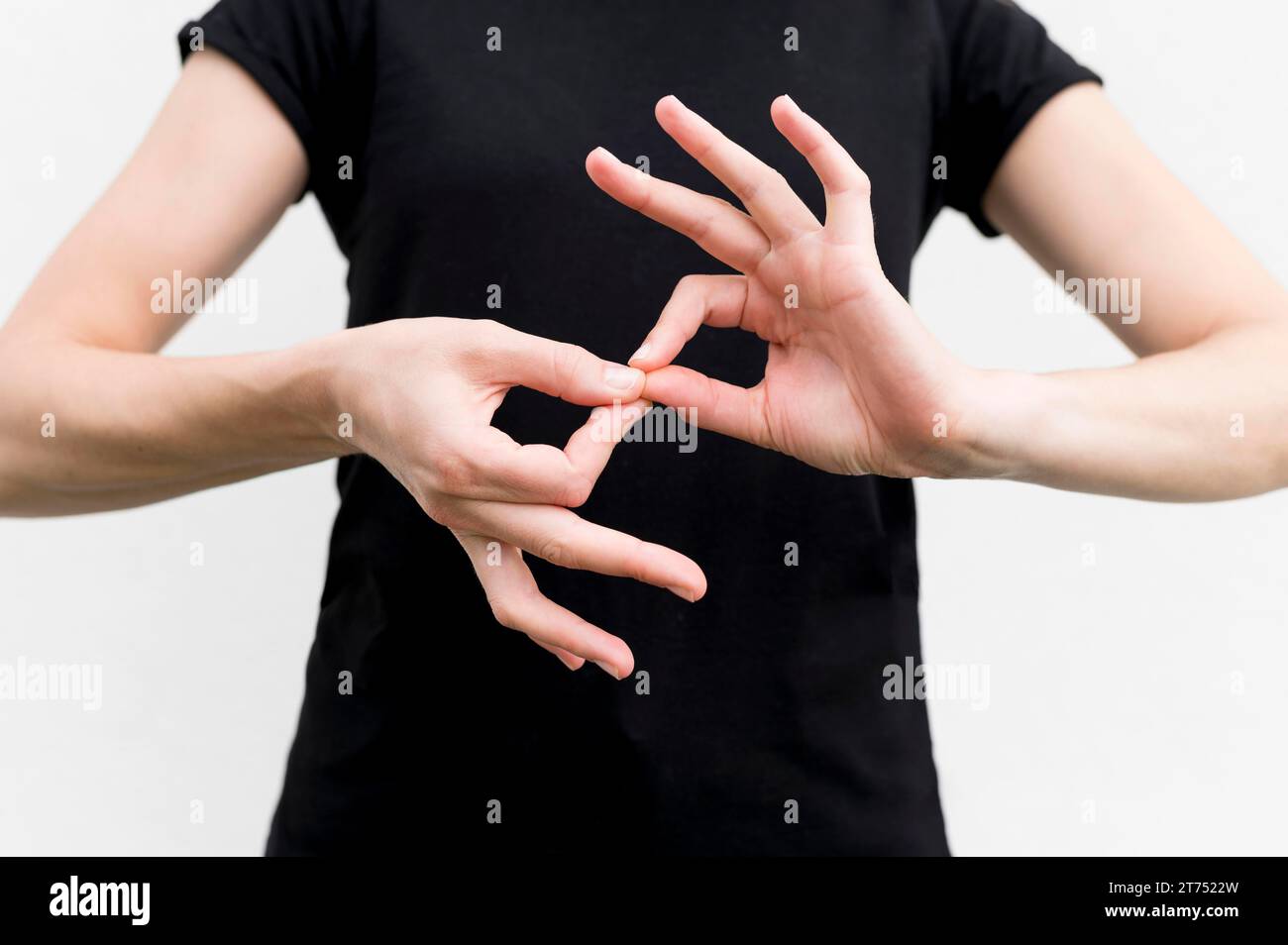 Deaf woman communicating through sign language Stock Photo - Alamy