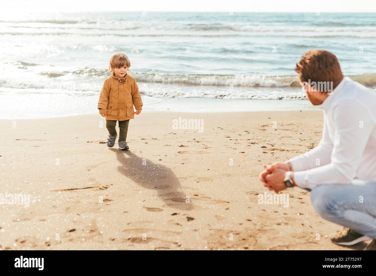 Father son near sea Stock Photo - Alamy