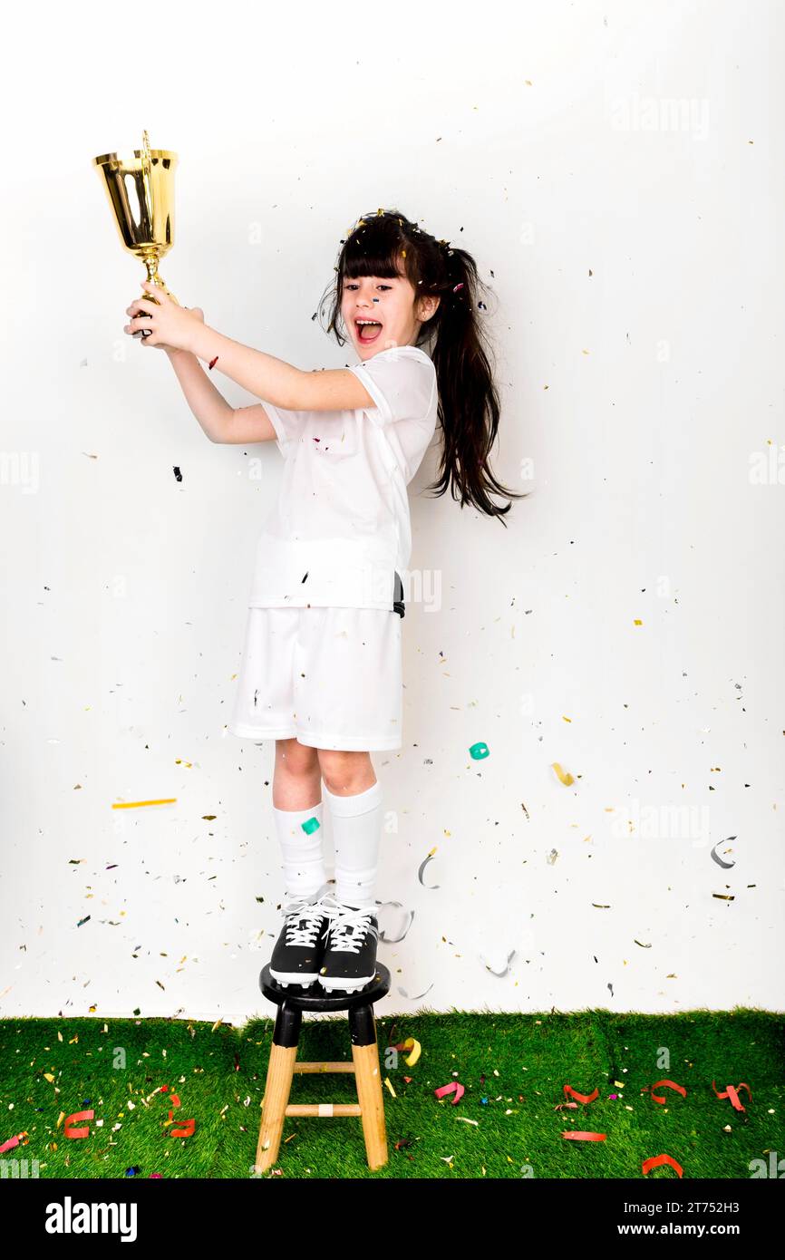 Girl trophy medal hi-res stock photography and images - Alamy