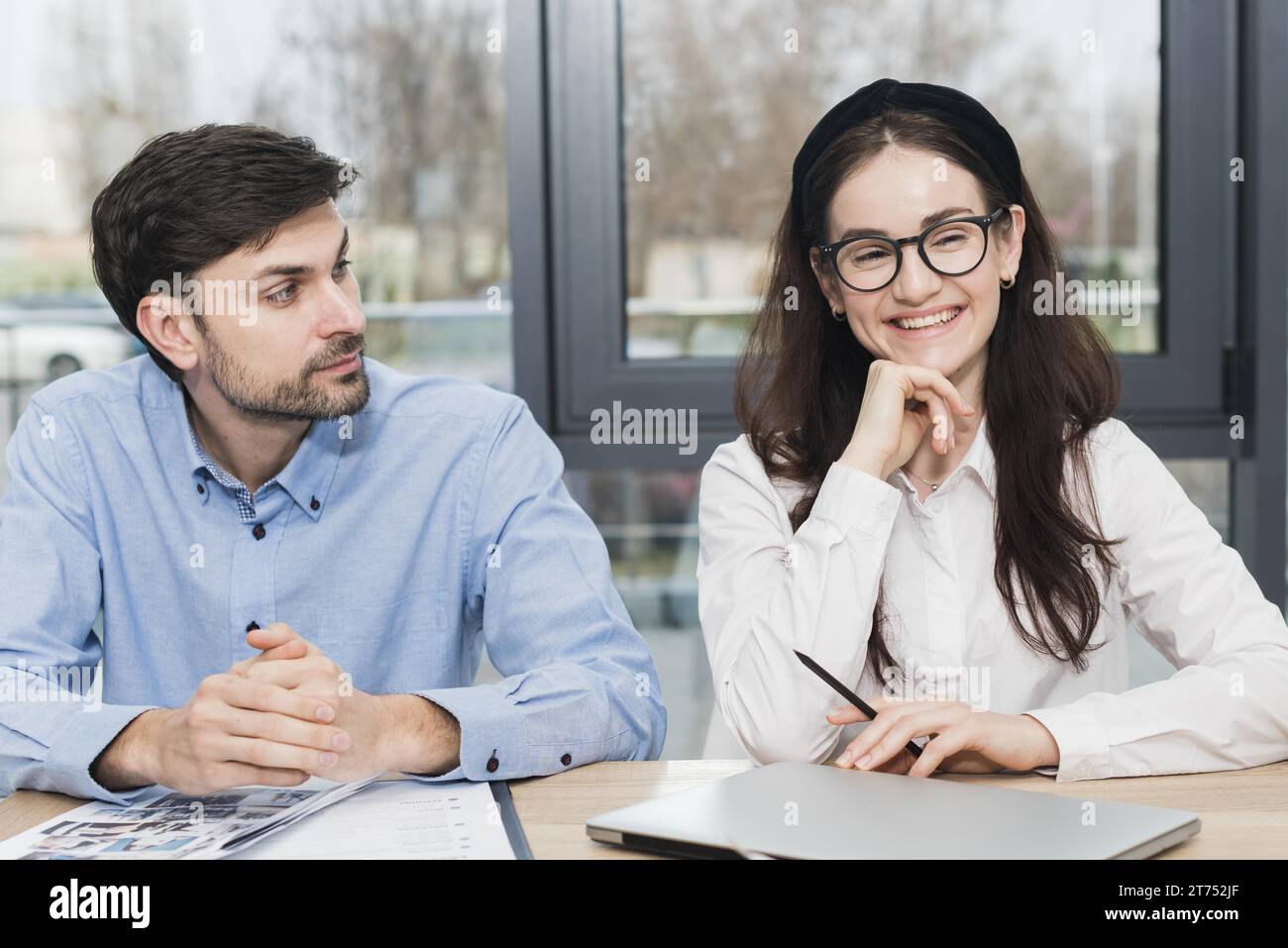 Front view man woman attending job interview Stock Photo - Alamy