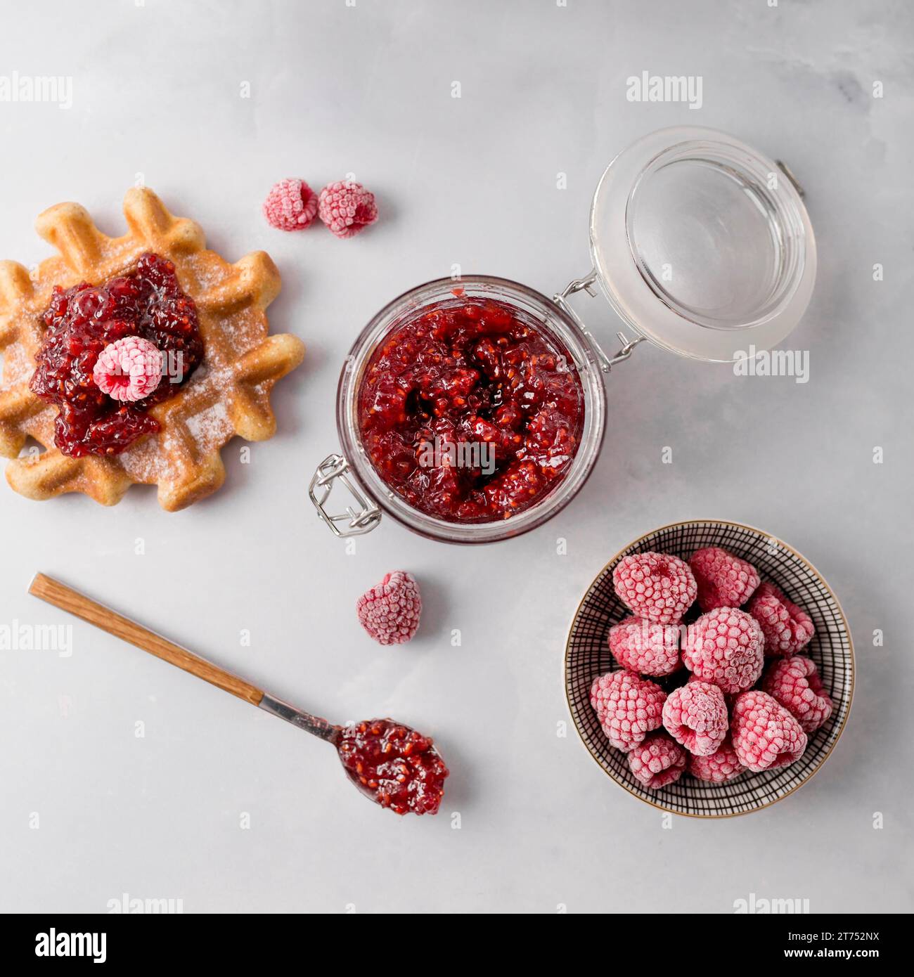 Frozen raspberries jam top view Stock Photo - Alamy