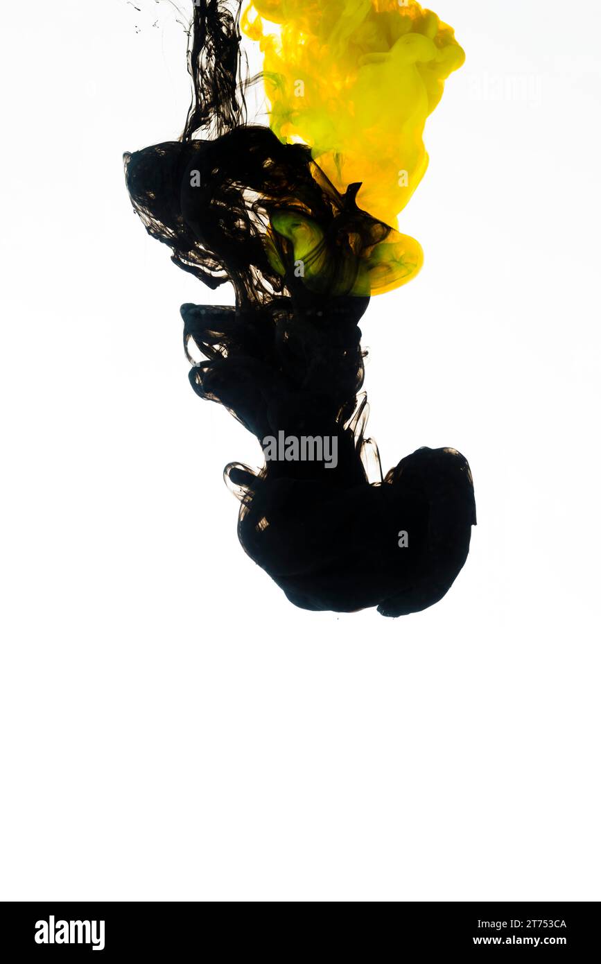 Mixing colorful ink droplets white Stock Photo - Alamy