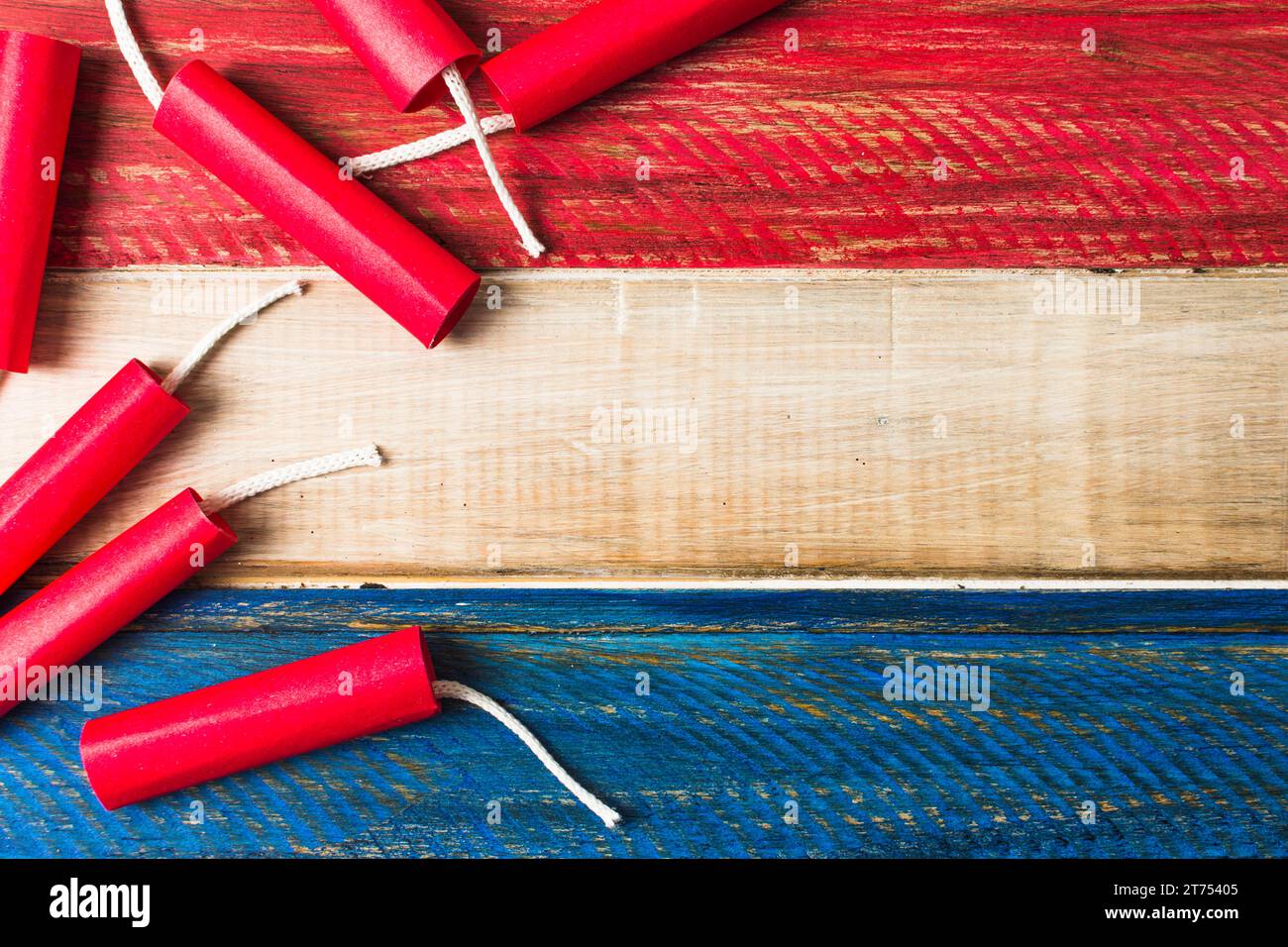 Red dynamite firecrackers wooden painted wooden plank background Stock ...
