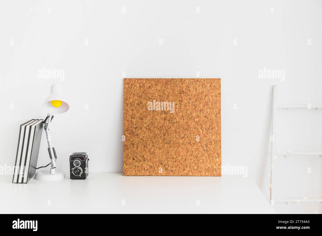 Teenage workspace white color with cork board Stock Photo - Alamy