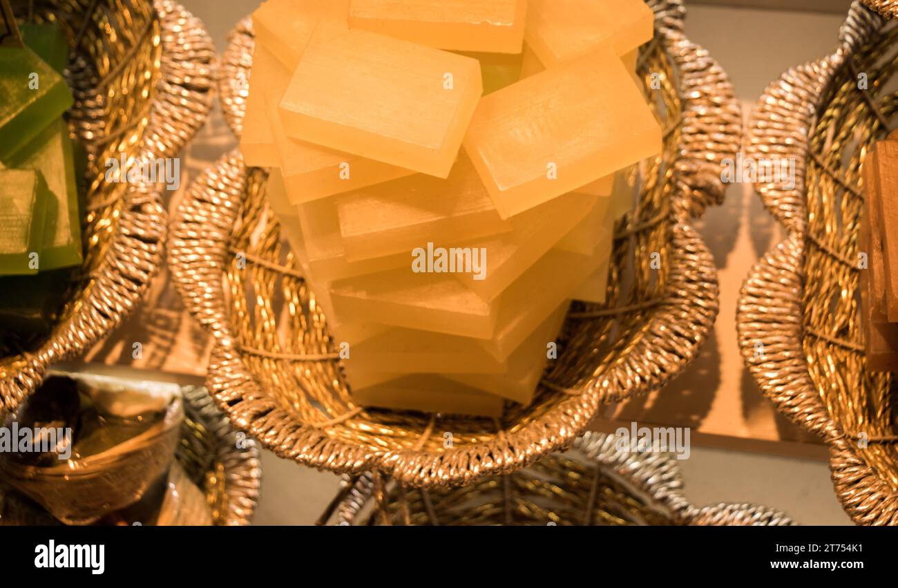 Collection of bars of fragrant hand made organic soap in a basket Stock ...