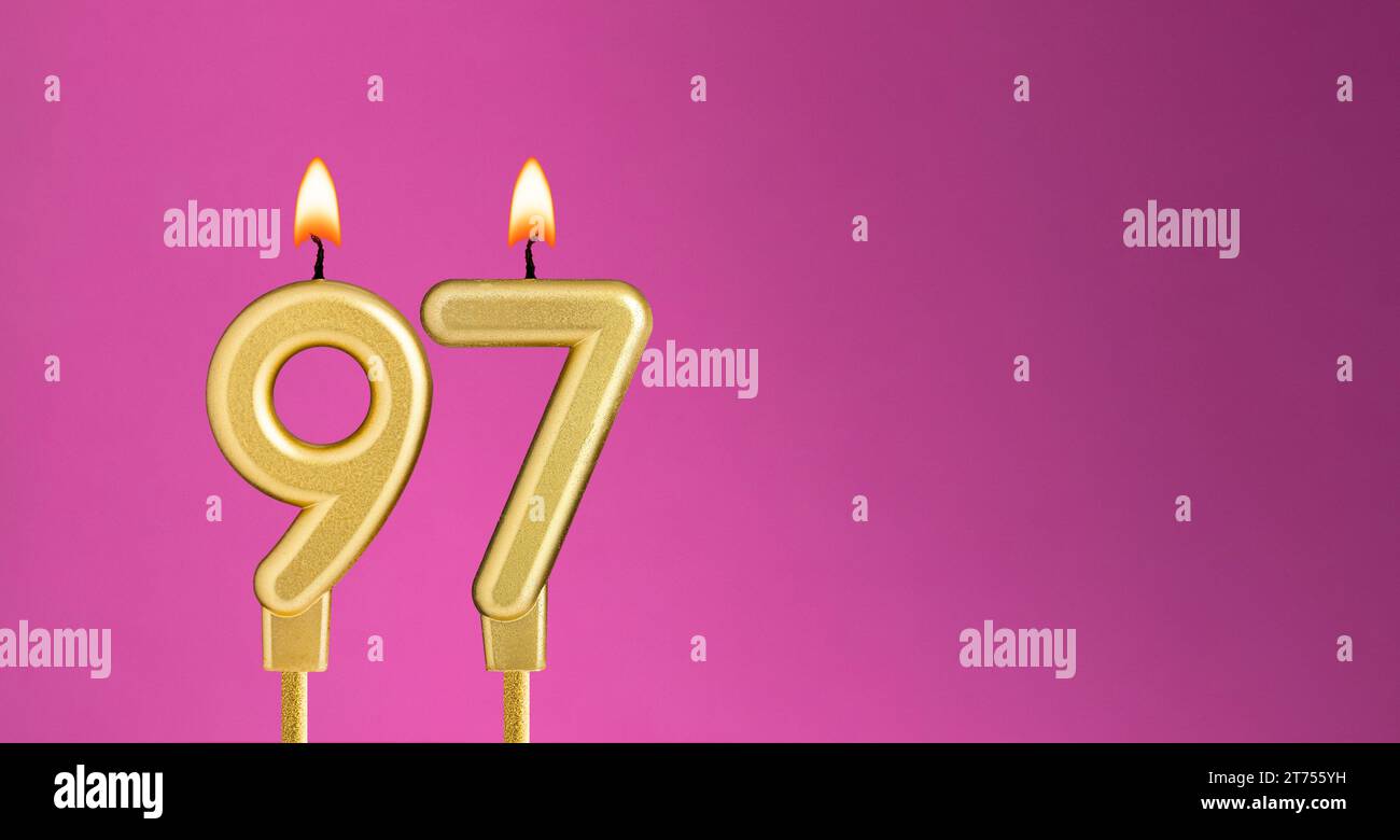 Candle number 97 in purple background - birthday card Stock Photo - Alamy