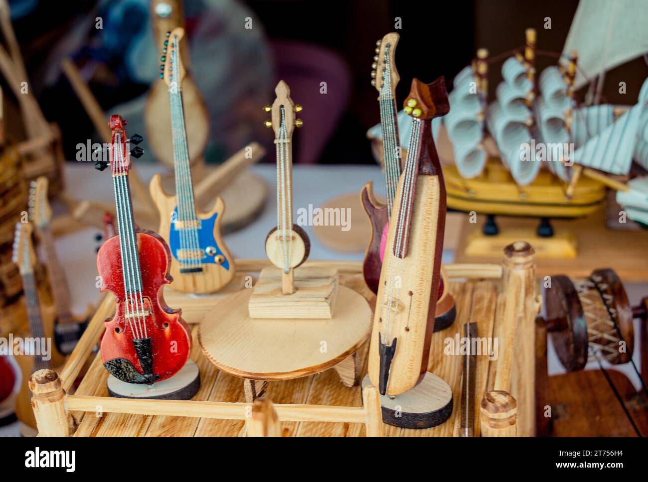 Set of models of musical instruments made of wood Stock Photo - Alamy