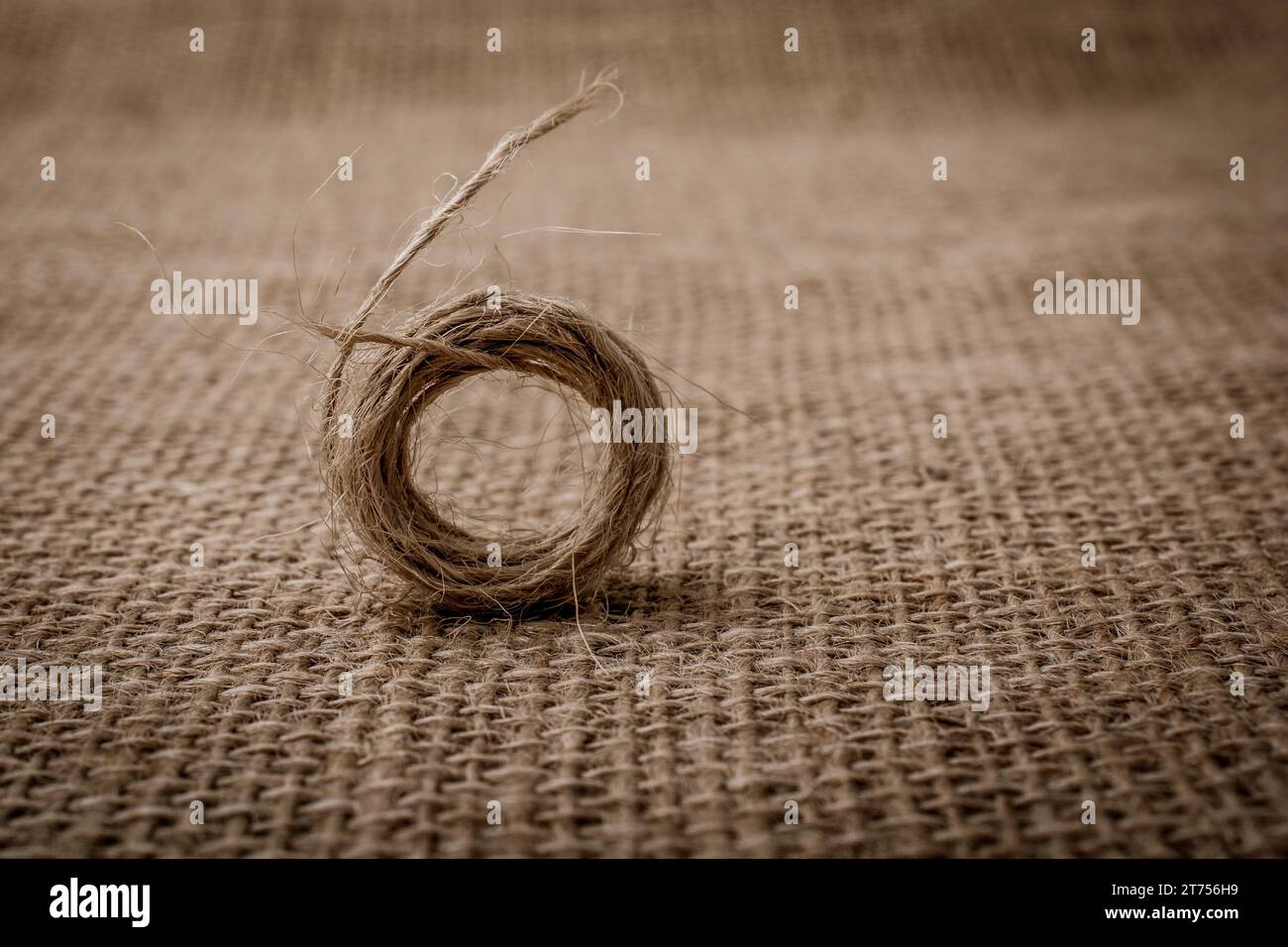 Roll of brown color linen string paper background Stock Photo - Alamy