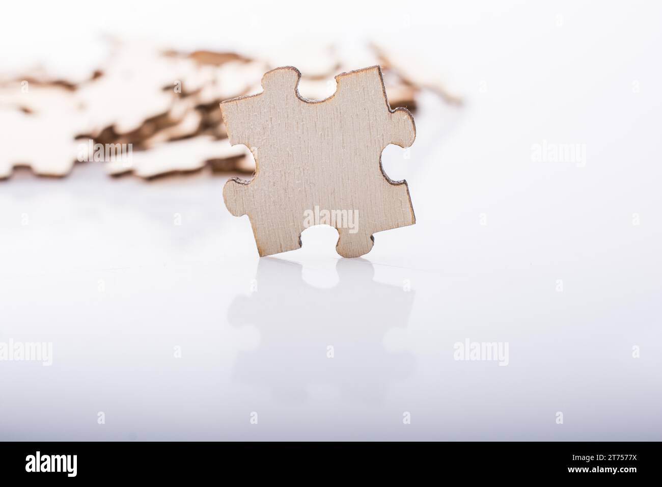 Pieces of jigsaw puzzle as problem solution concept on white background ...