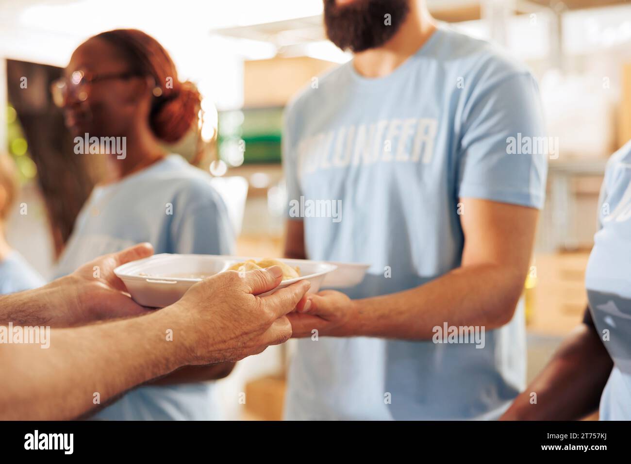 Free ration distributing hi-res stock photography and images - Alamy