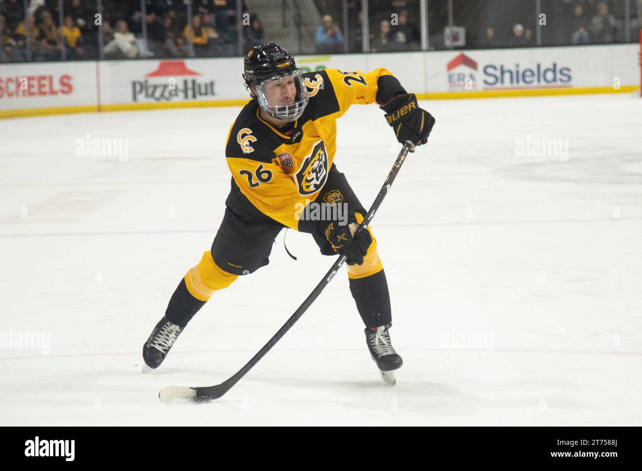Noah Laba of Colorado College fires a shot toward the Augustana College ...