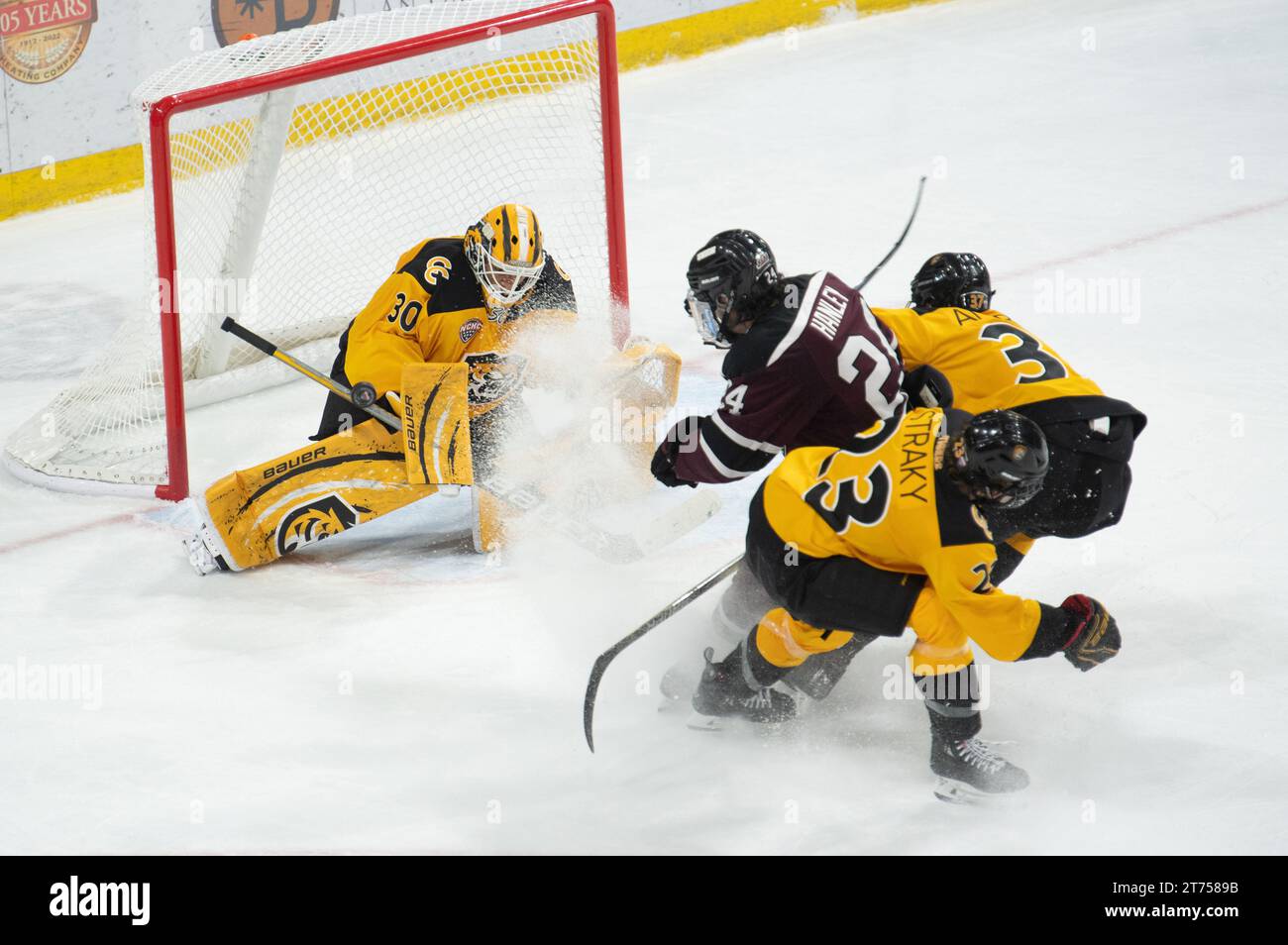 Goalie Kaidan Mbereko of Colorado College makes a save during a college ...