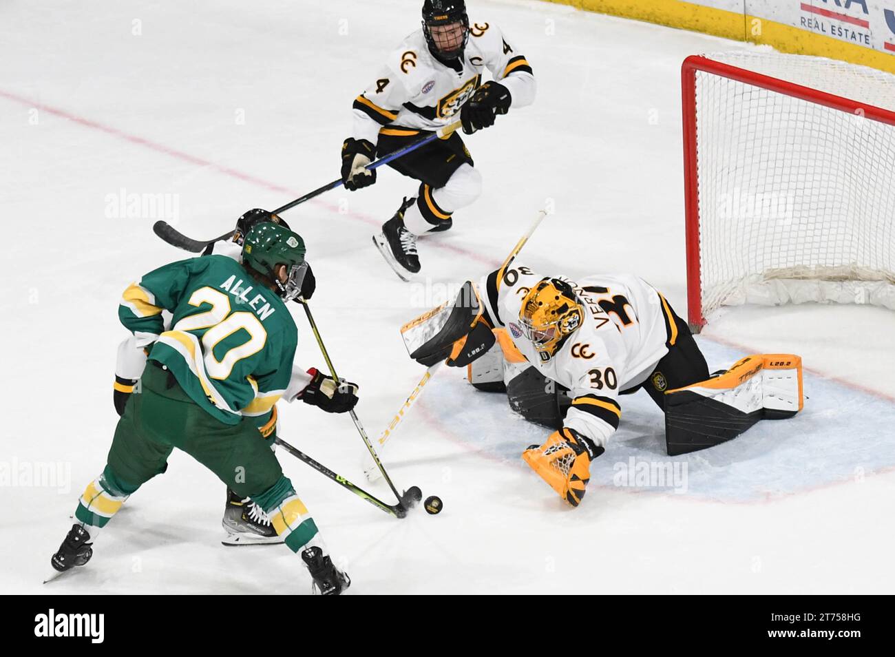 Colorado College goalie Matt Vernon (30) makes a save against a player ...