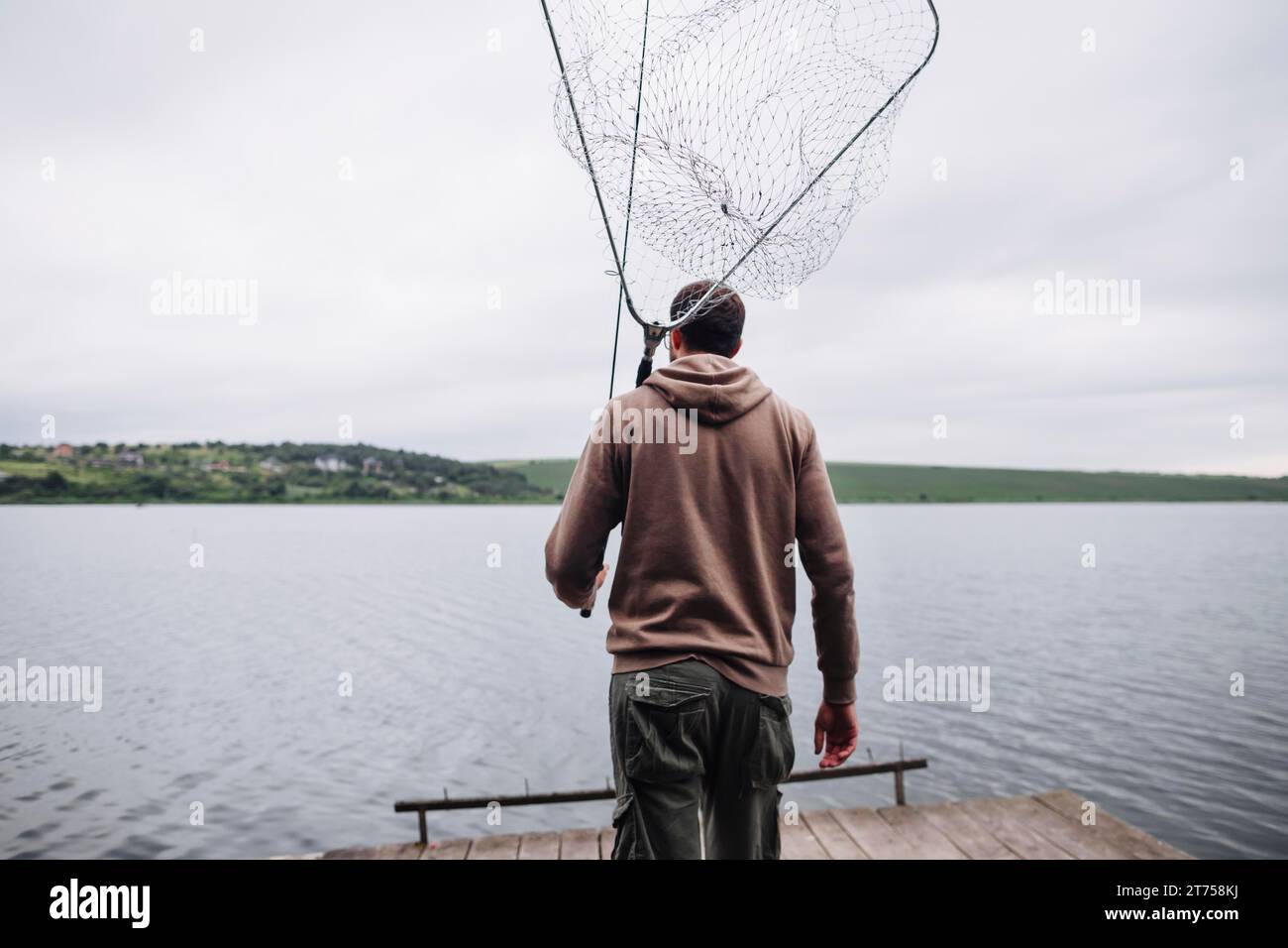 Barefoot man jeans hi-res stock photography and images - Alamy