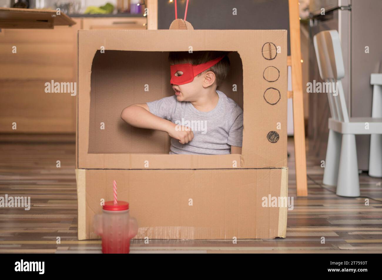 Boy cartoon tv box Stock Photo - Alamy