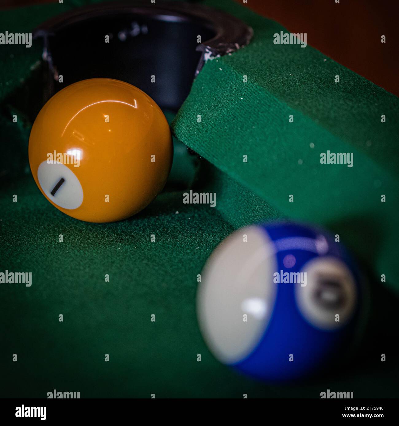 Billiard table setup featuring colorful pool balls, ready for an ...