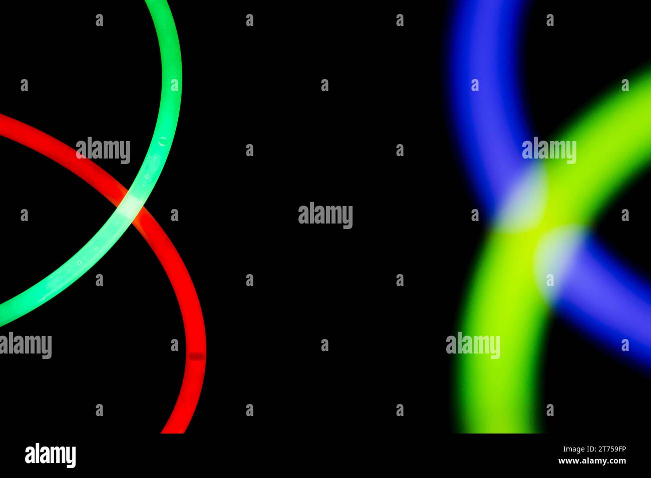 Colorful light tube dark background Stock Photo - Alamy