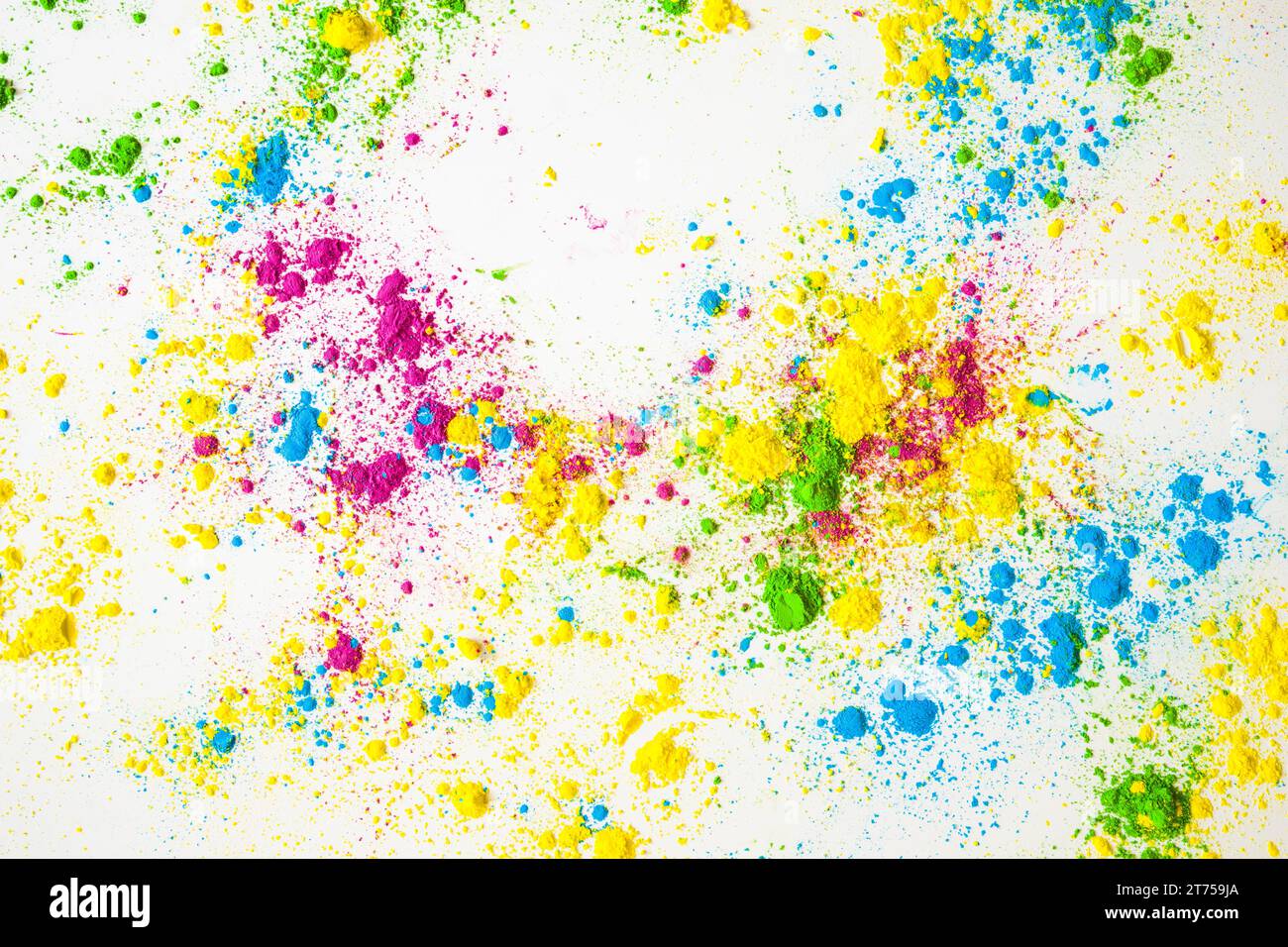 Different type mixed color powder white backdrop Stock Photo - Alamy