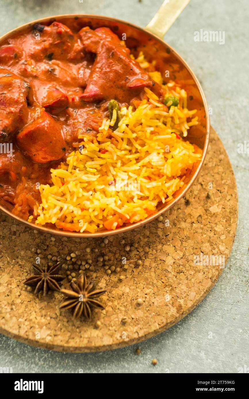 Dry spices near rice dish Stock Photo - Alamy