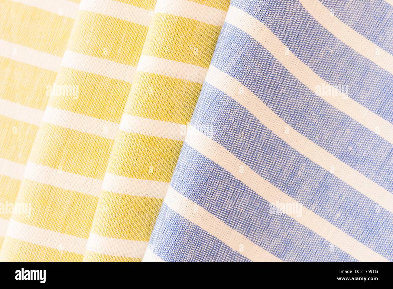 Folded yellow blue fabric linen Stock Photo - Alamy