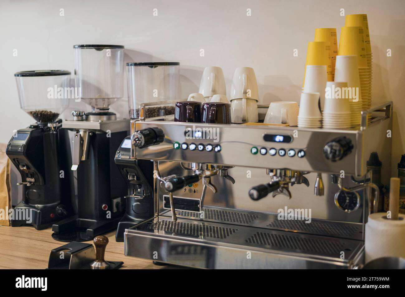 Front view coffee machine with loads cups Stock Photo - Alamy