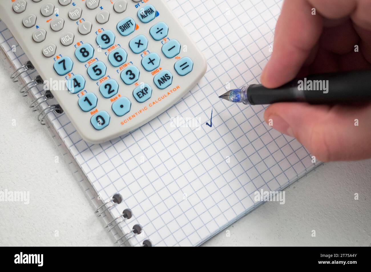 Hand writing with pen paper Stock Photo - Alamy