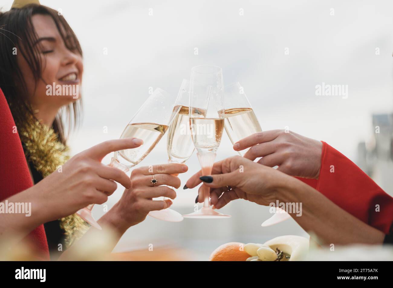 Happy girls cheering up glasses champagne Stock Photo - Alamy