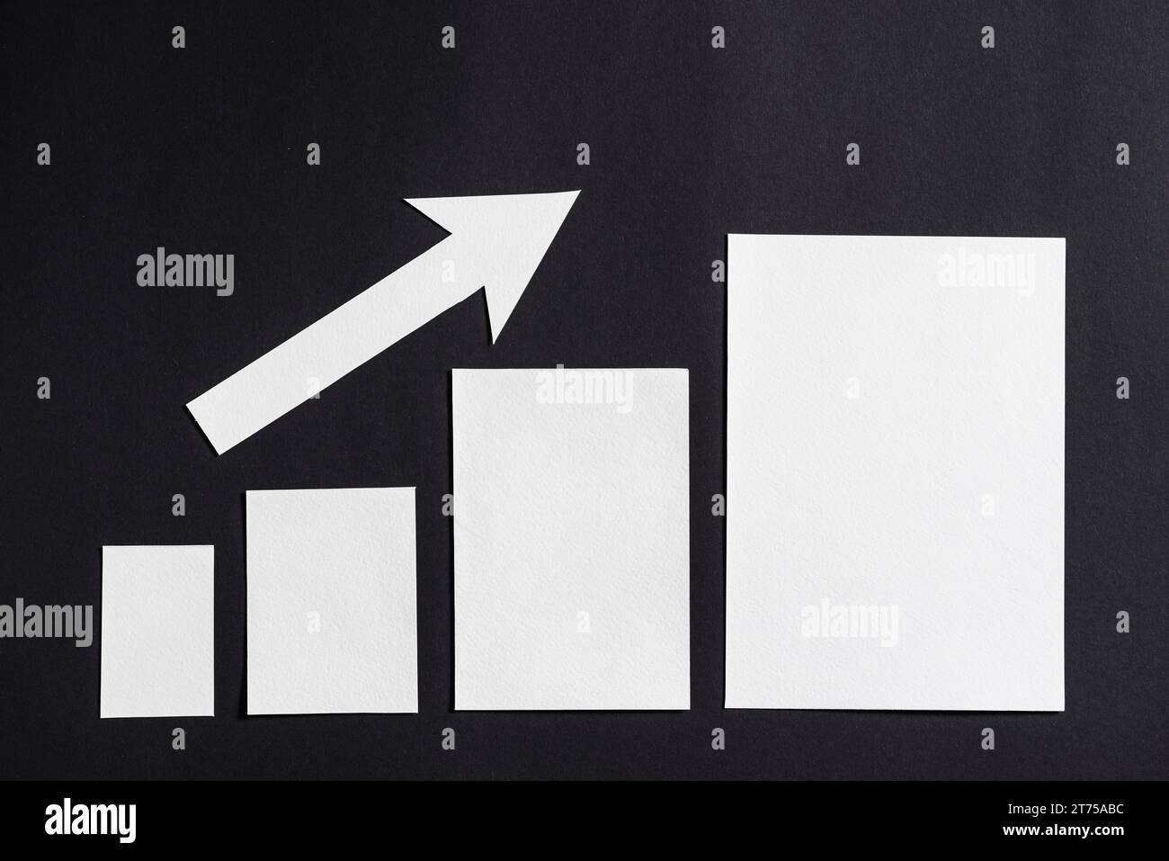 Increasing plain white graph with arrow black backdrop Stock Photo - Alamy