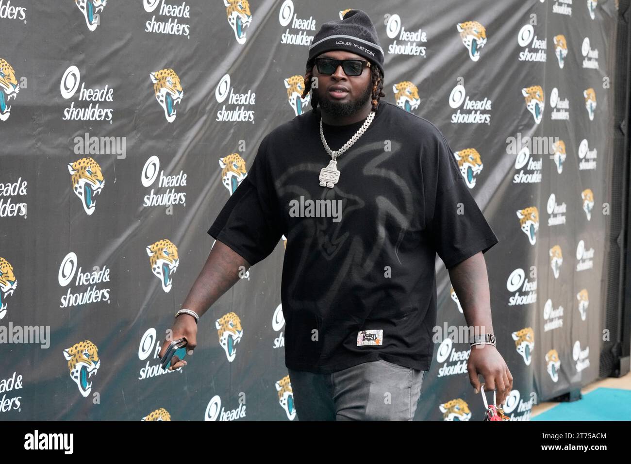 Jacksonville Jaguars offensive tackle Anton Harrison arrives at the ...