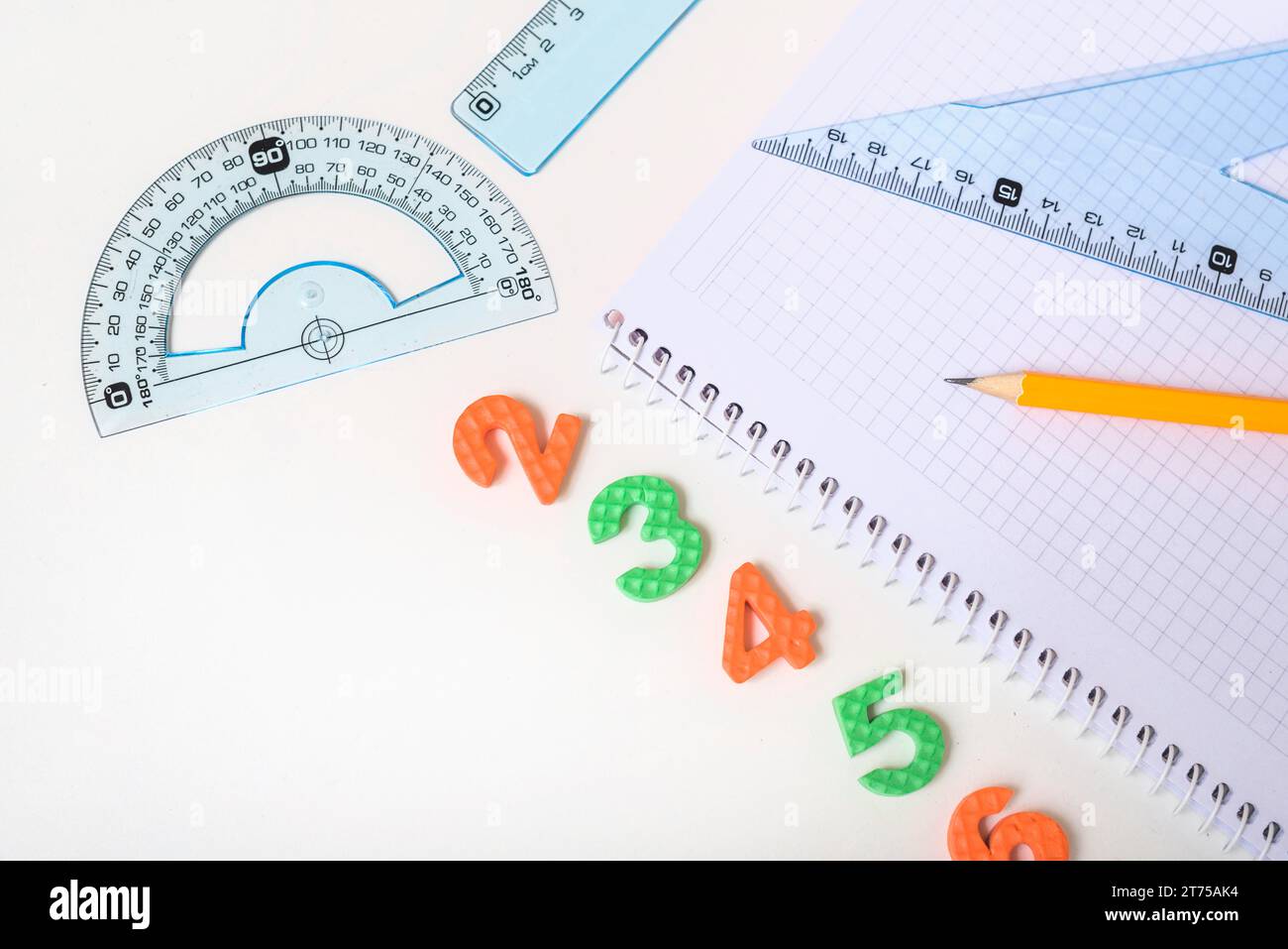 Numbers lying near stationery Stock Photo - Alamy