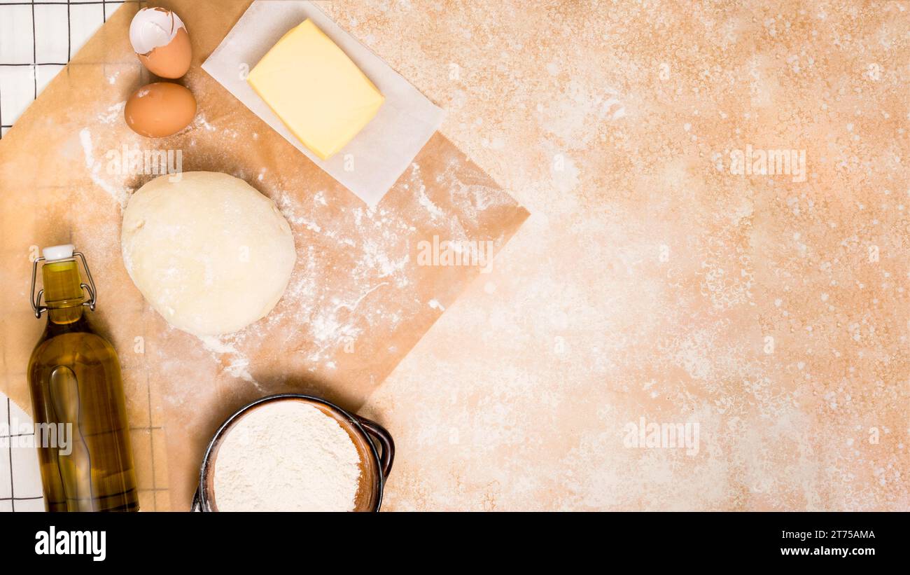 Oil bottle flour butter block eggs ball dough kitchen counter Stock ...