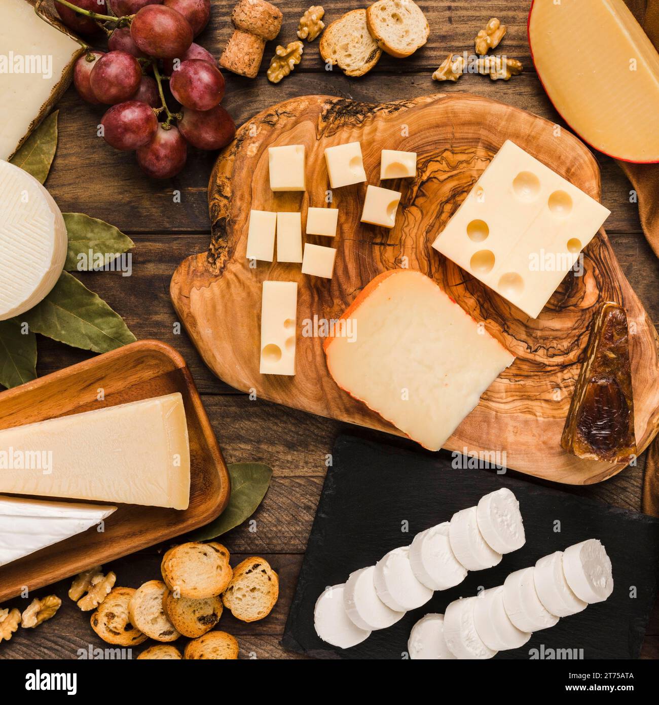 Piece natural cheeses cheese board with tasty ingredient wooden desk ...