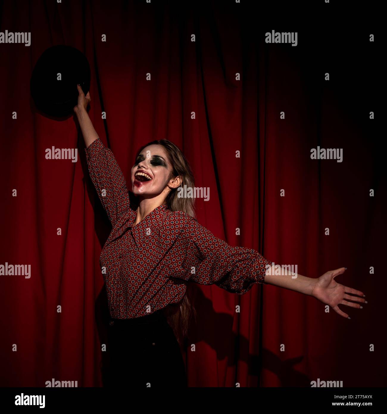 Side view woman dressed as clown being happy Stock Photo - Alamy