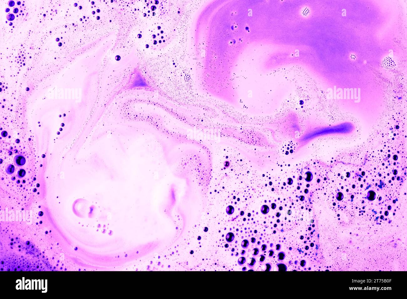 Purple bath bomb bubble background Stock Photo - Alamy