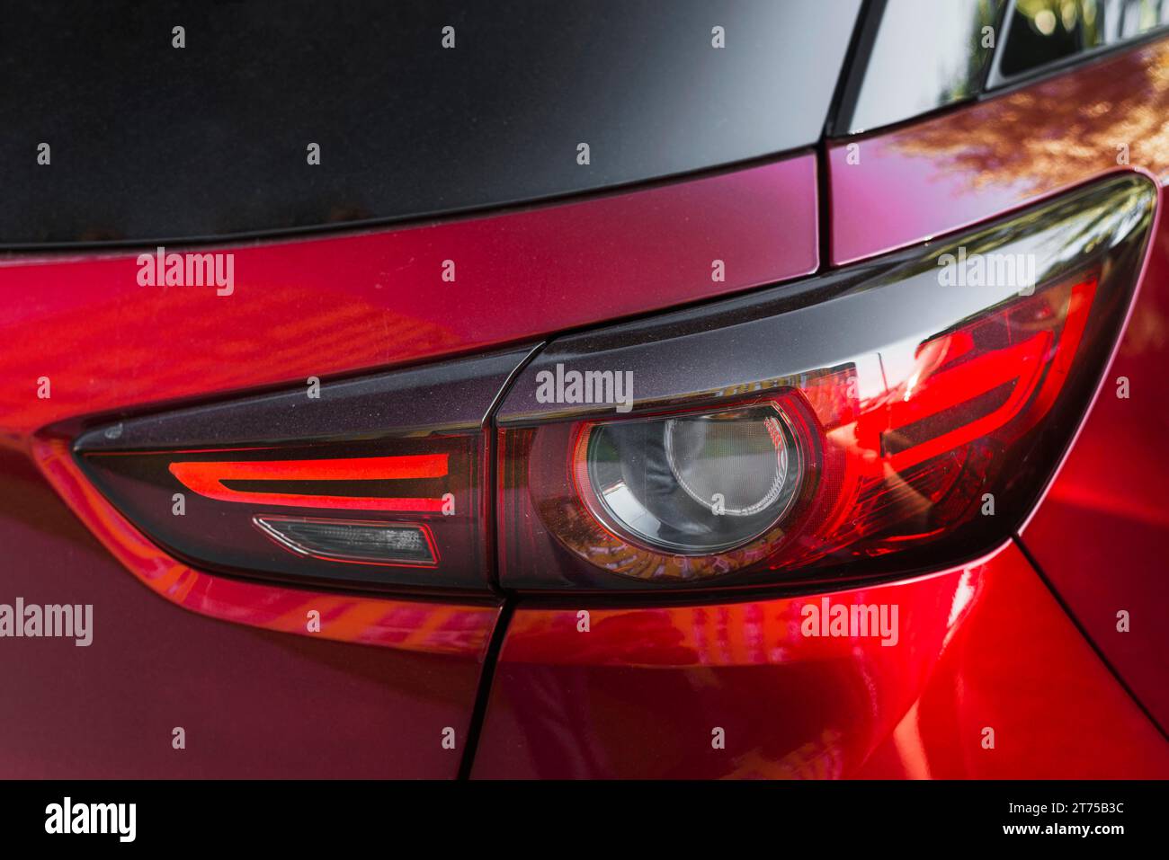 Stylish rear light new red auto Stock Photo - Alamy