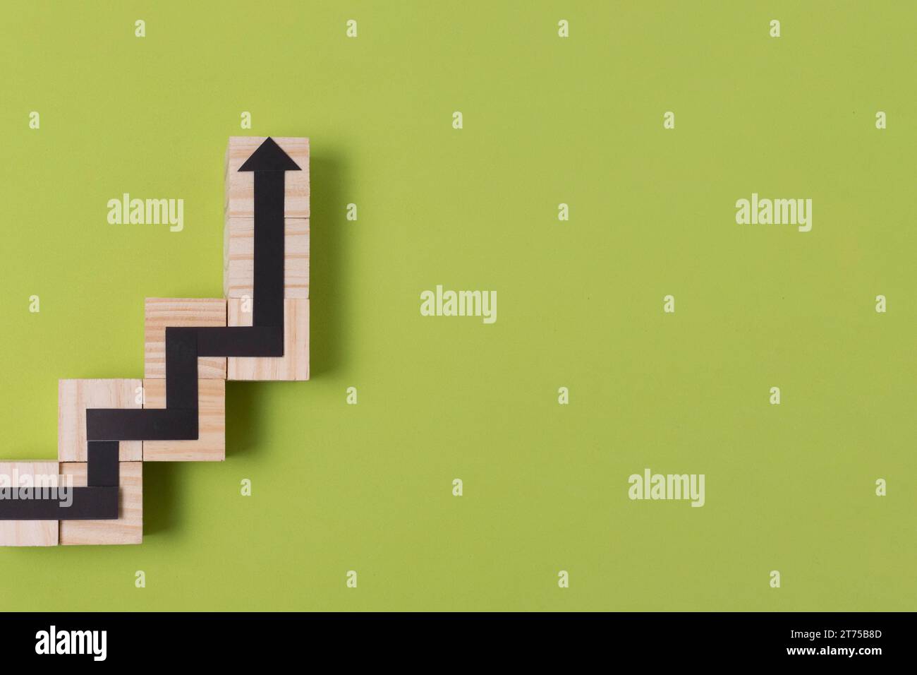 Snake game arrow with wooden outline copy space Stock Photo - Alamy