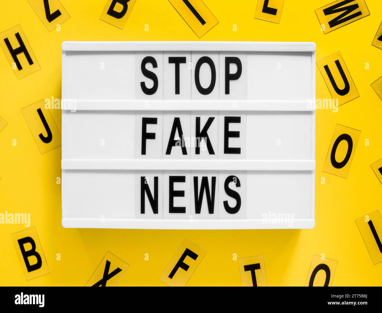 Stop making fake news letters background Stock Photo - Alamy