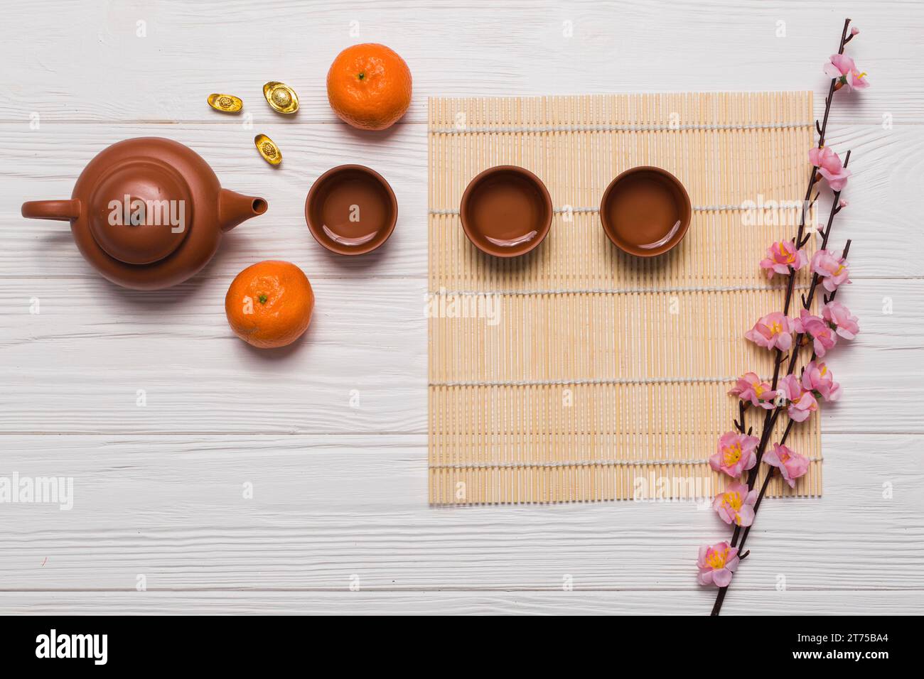 Tea set sakura branch Stock Photo - Alamy