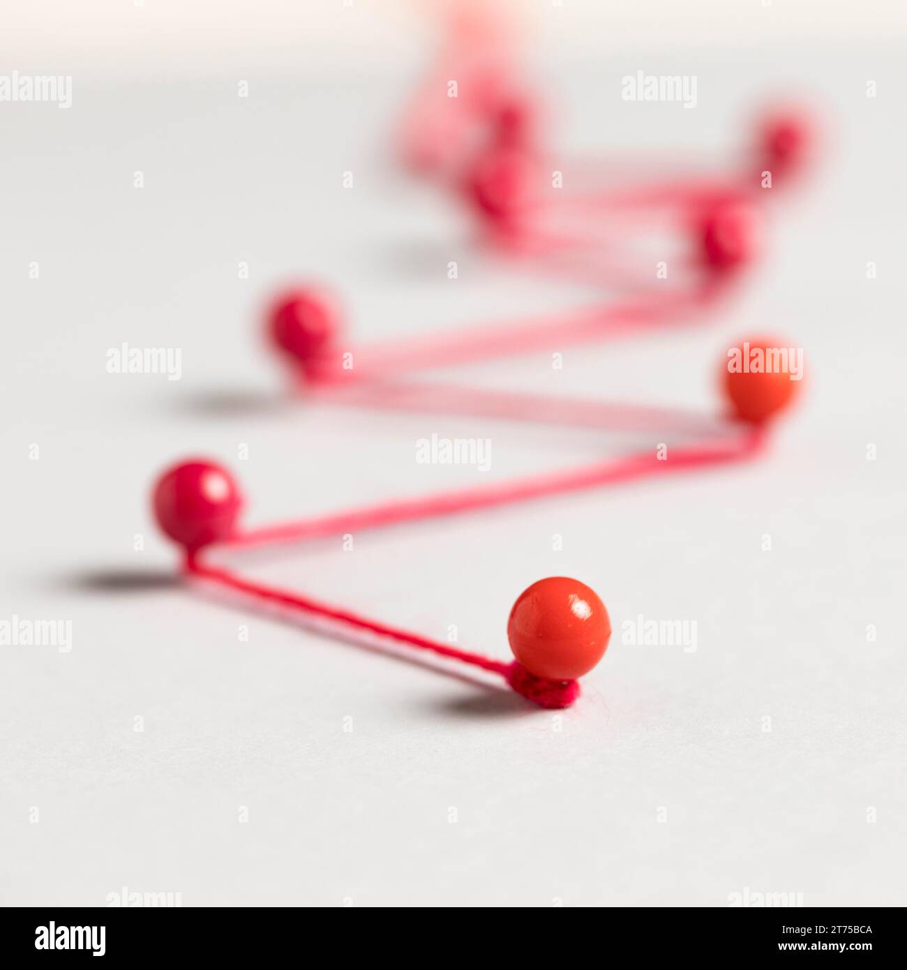 Thread red pushpin route map Stock Photo - Alamy
