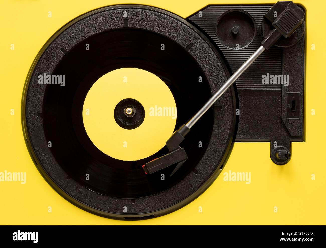 Top view vinyl yellow background Stock Photo - Alamy