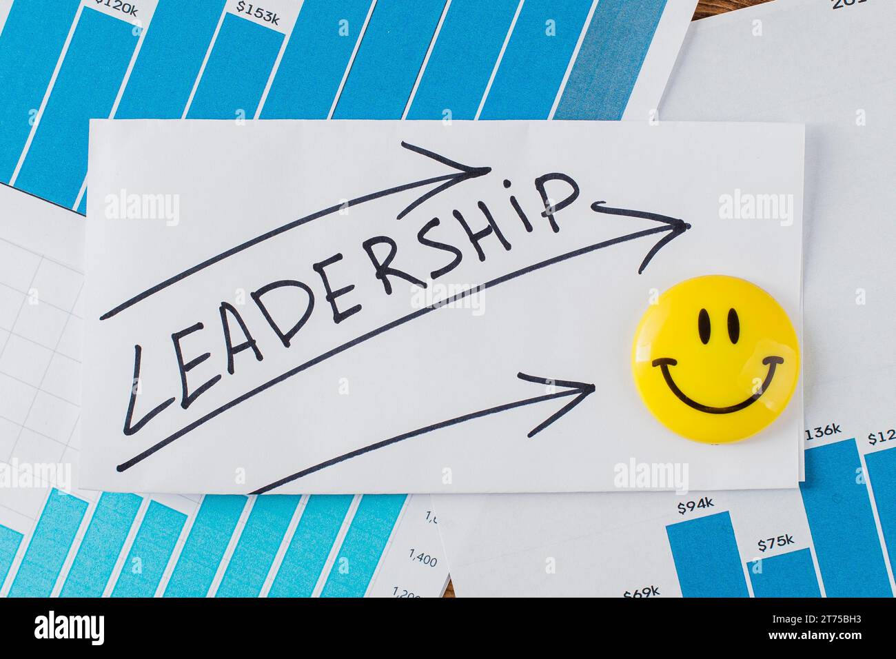 Top view smiley face with word leadership Stock Photo - Alamy