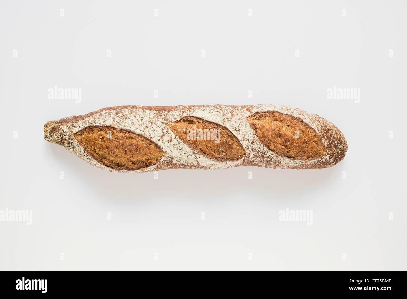 Whole rustic baked baguette white background Stock Photo - Alamy