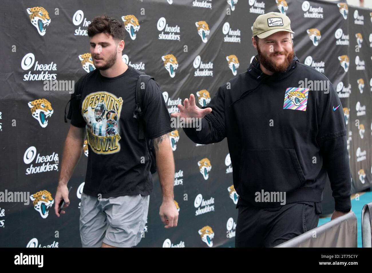 Jacksonville Jaguars tight end Luke Farrell, left, and center Luke ...