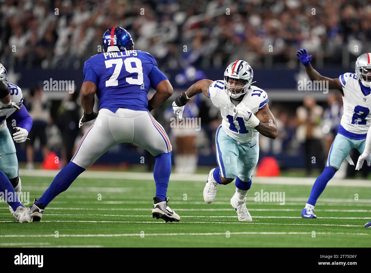 New York Giants offensive tackle Tyre Phillips (79) defends against a rush by Dallas Cowboys ...